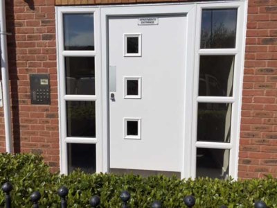 communal-entry-door-system - B and L Roller Shutters and Garage Doors